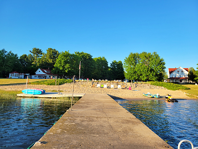 The resort's dock stretches into Lake Leelanau like an invitation, promising adventures on kayaks or simple moments watching ripples dance across water.
