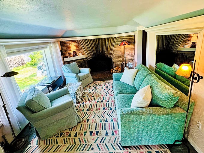 Sink into these plush sofas surrounded by stone walls and imagine you're relaxing in a woodland creature's sophisticated den.