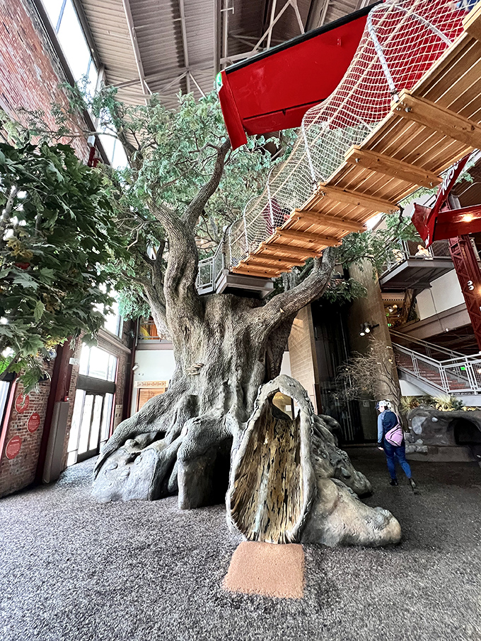 This isn't just any tree&mdash;it's a masterpiece of design that reaches toward the ceiling, inviting visitors to explore its branches and hidden pathways.