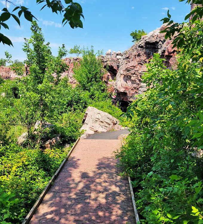 The well-maintained pathway guides visitors through geological wonders, making this billion-year-old classroom accessible to explorers of all abilities.