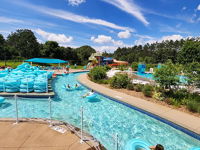 The lazy river winds through the park like a liquid tour guide, offering the perfect excuse to float away your worries.