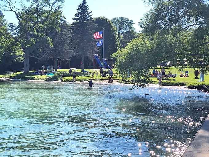Perfect Michigan summer days unfold at this shoreline park, where families have been making memories since your grandparents were kids.