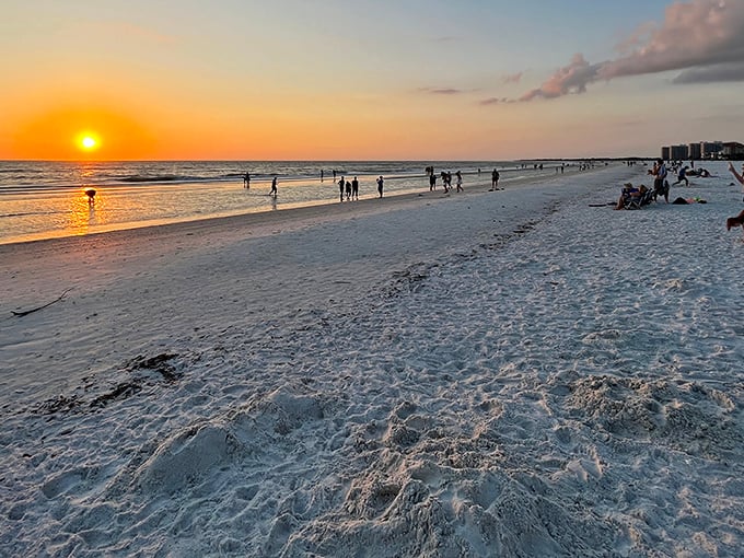 The sun takes its final bow on Marco Beach, painting the sky in hues no Instagram filter could ever replicate.