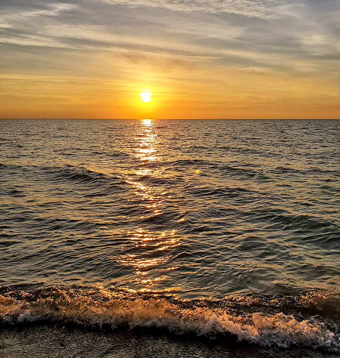 Nature's light show begins as the sun dips toward the horizon, painting the sky in hues no artist could fully capture.