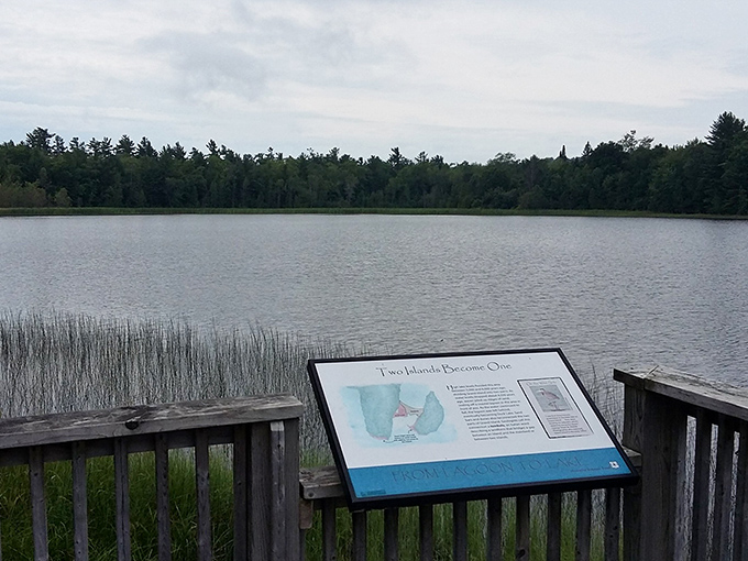 Two Islands Become One: A serene lake view where water and sky merge, creating nature's perfect mirror image.