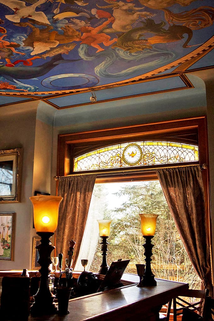 Interior: Look up! The celestial ceiling mural transforms an ordinary room into an extraordinary experience, with mythological figures seemingly dancing above visitors' heads.