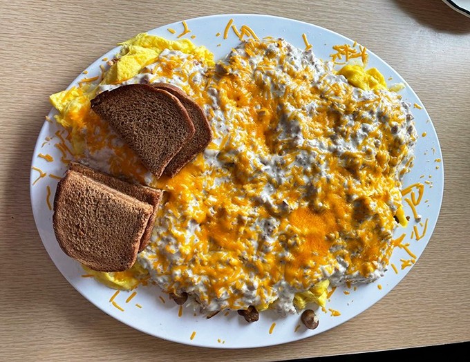 This isn't just breakfast&mdash;it's an eggy expedition across a landscape of cheese and hash browns that requires strategy.