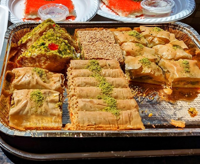 A treasure trove of baklava varieties awaits, each piece a perfect architecture of phyllo, nuts, and honey that shatters delicately with every bite.