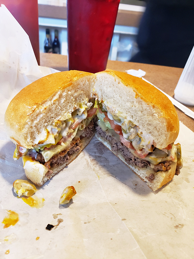 This isn't just a bacon double cheeseburger; it's a masterclass in balance and proportion, where every ingredient plays its part in perfect harmony.