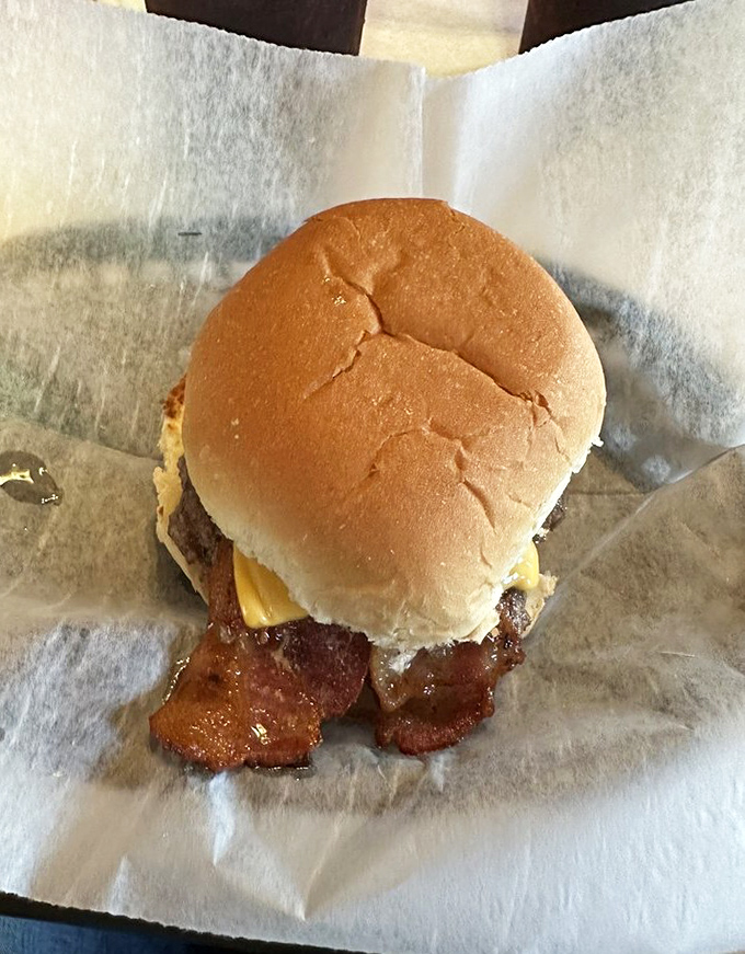 The legendary bacon cheeseburger in all its unpretentious glory &ndash; proof that perfection doesn't need fancy ingredients, just decades of know-how.