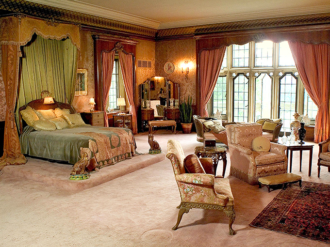 A bedroom fit for royalty &ndash; or at least someone who sold a lot of cars &ndash; where luxury meets comfort in a symphony of silk and mahogany.