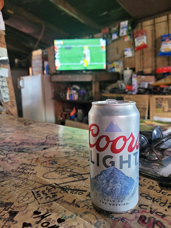 A cold Coors Light awaits while a game plays on the modest TV &ndash; simple pleasures in a complicated world.