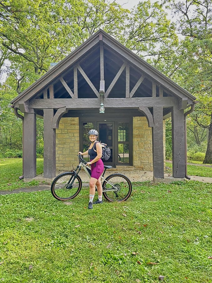 Rustic charm meets natural wonder: This stone shelter, built by the CCC in the 1930s, serves as the perfect trailhead gateway.