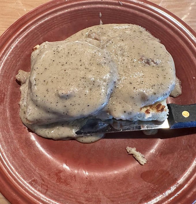 Biscuits and gravy that could make a grown person weep&mdash;velvety sauce blanketing pillowy biscuits in a comfort food masterpiece.