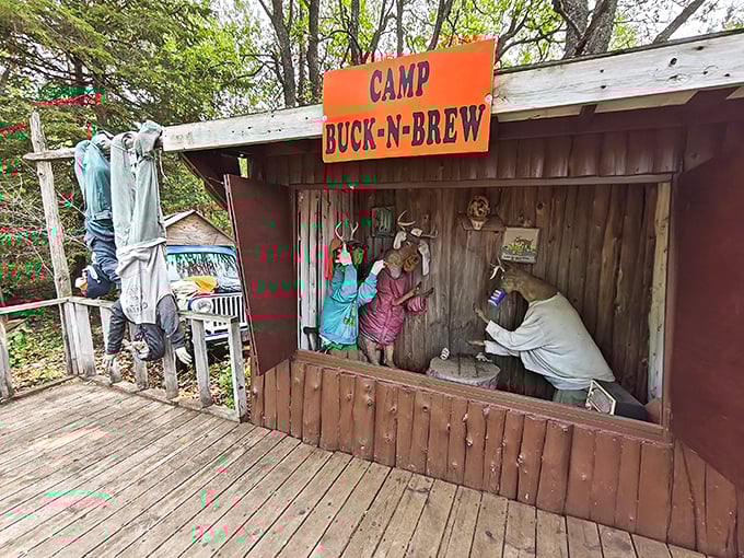 Life-sized mannequins recreate a typical hunting camp scene, complete with flannel shirts and an unmistakable focus on beer consumption.