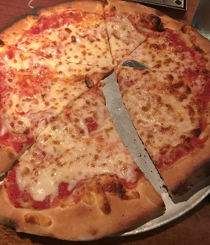 Sometimes simplicity is the ultimate sophistication &ndash; this cheese pizza showcases the perfect balance of sauce, cheese, and that incredible wood-fired crust.