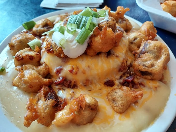The Potterville Poutine elevates comfort food to art form &ndash; crispy gizzards nestled on mashed potatoes under a blanket of melted cheese.