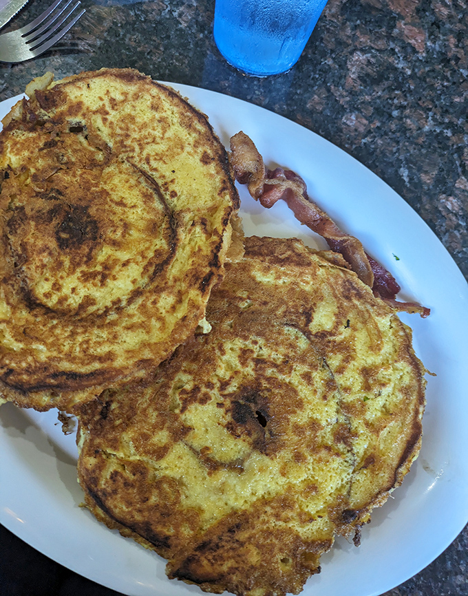 Golden spirals of cinnamon-infused bread transform the humble French toast into something worth crossing county lines for.