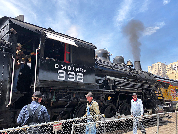 The historic Duluth Train Depot stands proudly with its steam locomotive, a nostalgic reminder of when travel itself was the main attraction.