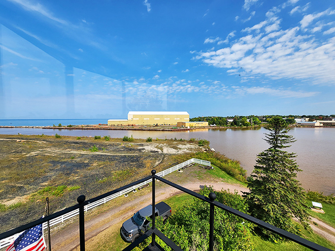 This elevated coastal panorama showcases why lighthouse locations weren't random &ndash; strategic positioning meant the difference between safe harbor and maritime disaster.