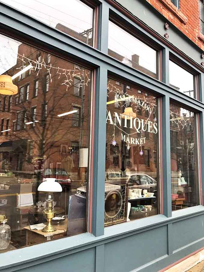 The "ANTIQUES" sign might as well read "ABANDON ALL BUDGET YE WHO ENTER HERE" for enthusiastic collectors and nostalgic browsers alike.