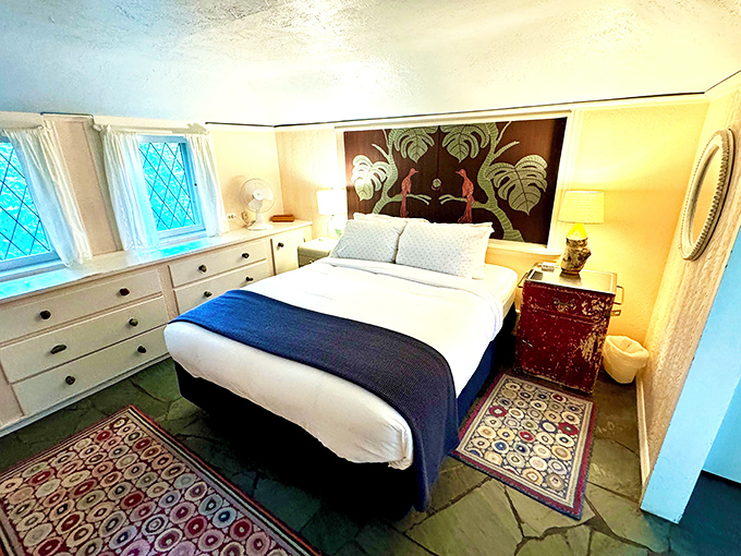 Sweet dreams guaranteed in this first-floor bedroom where fantasy meets comfort under a ceiling that seems to embrace you.