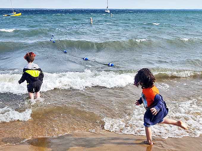 Little explorers discover the simple joy of splashing in gentle waves, creating memories that will outlast any sandcastle.