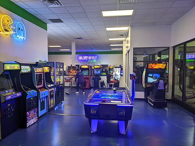 Classic arcade cabinets stand sentinel in this temple of nostalgia, each one a portal to simpler, more pixelated times.