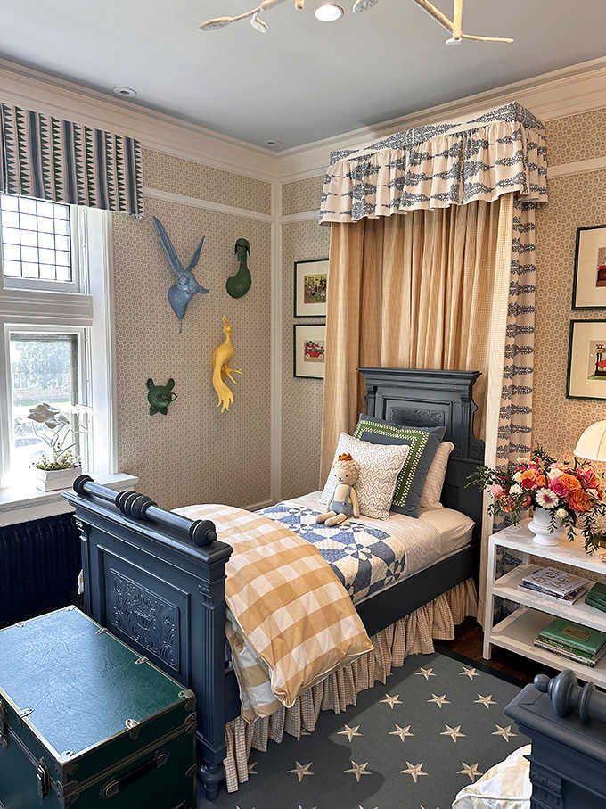 Childhood dreams come alive in this whimsical bedroom, where star-patterned rugs and nautical touches inspire young imaginations to set sail.