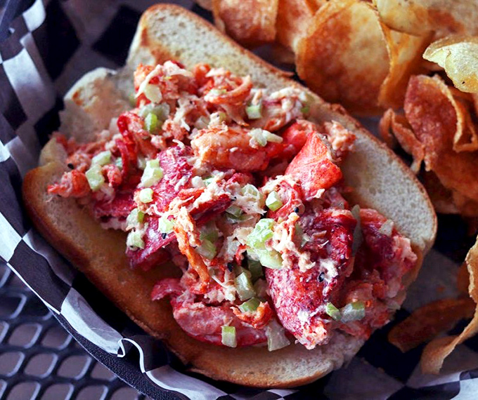 This lobster roll isn't just a sandwich &ndash; it's a coastal vacation between bread, where chunks of sweet lobster meat meet perfect seasoning.