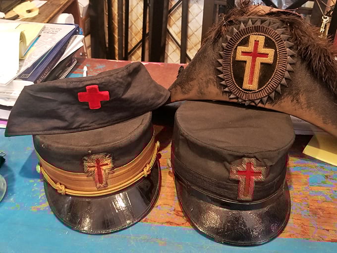 These Masonic Knights Templar caps weren't just fashionable headwear, they were the original "secret society" membership cards before LinkedIn made networking less mysterious.