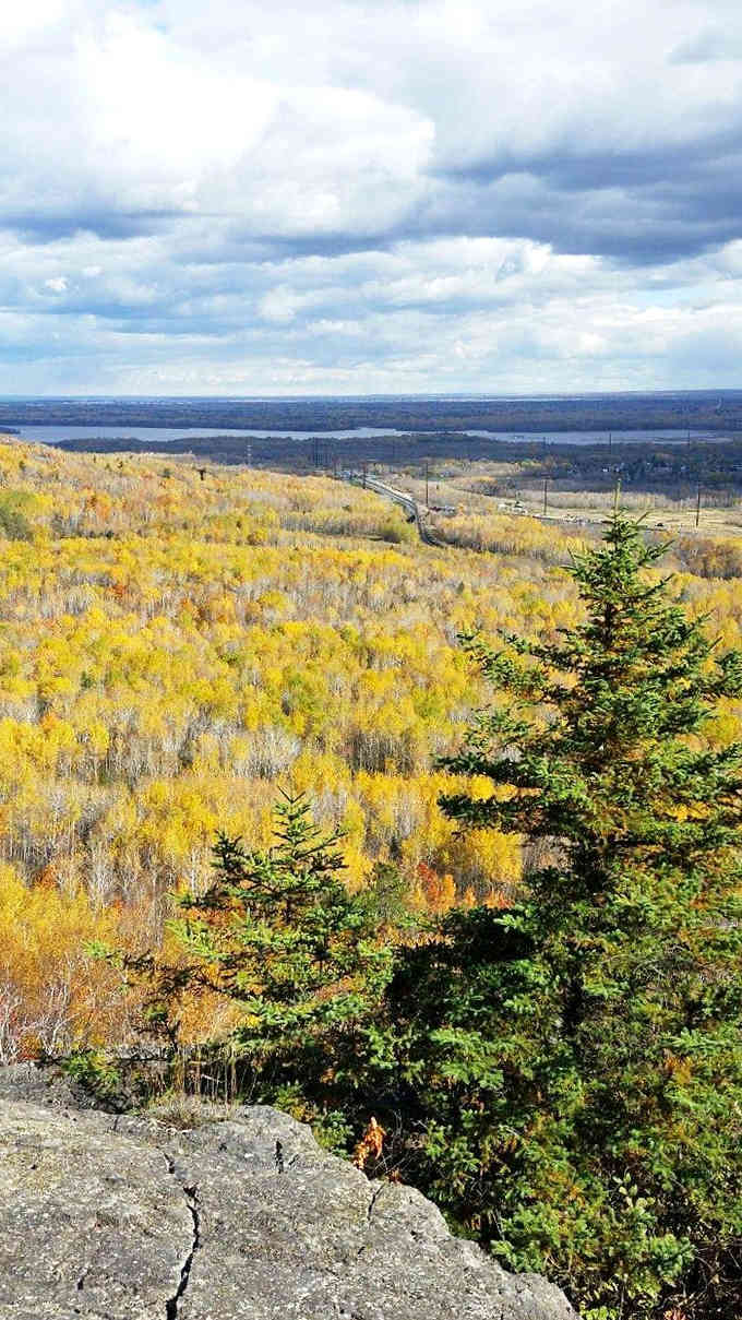 From this breathtaking overlook, Lake Superior stretches to the horizon like a blue infinity pool designed by Mother Nature herself.