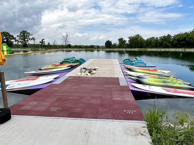 Paddleboards lined up and ready for those seeking a more peaceful lake experience.