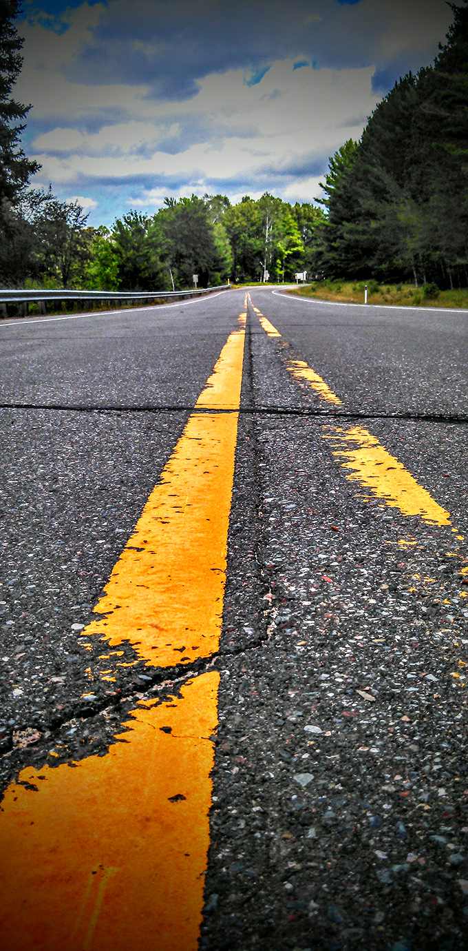 Just an ordinary country road by day, but as darkness falls, it becomes the gateway to one of Michigan's most enduring mysteries.