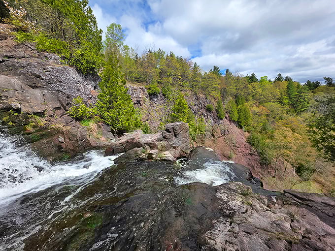 Where rushing water meets ancient stone, creating that satisfying gurgle-splash soundtrack that no meditation app can truly replicate. Nature's white noise machine!
