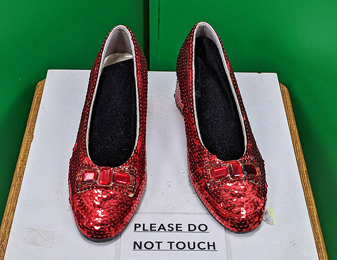 Those magical ruby slippers that carried Dorothy home – sequins still dazzling decades later, protected behind glass but still capturing every visitor's imagination.