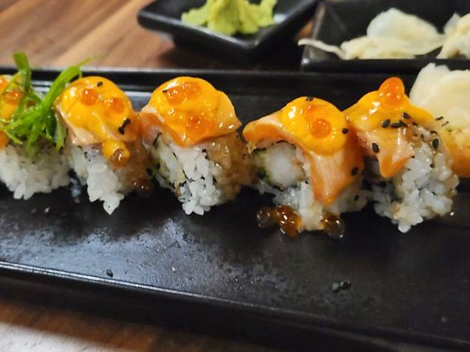 Salmon rolls elevated to art form &ndash; each piece topped with tobiko that pops like tiny flavor fireworks in your mouth.