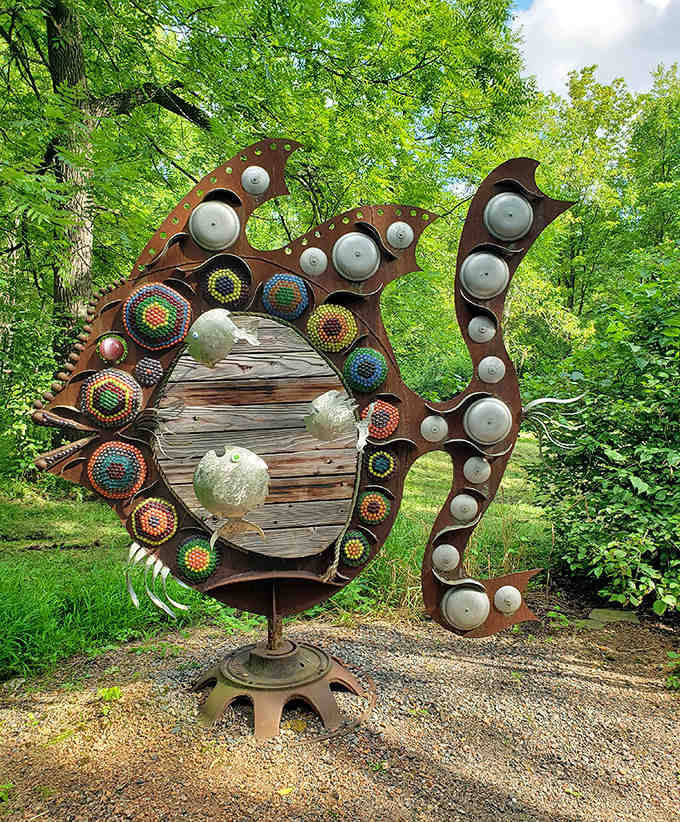 Not your average catch of the day! This whimsical metal fish combines colorful bottle caps and industrial scraps into aquatic art.