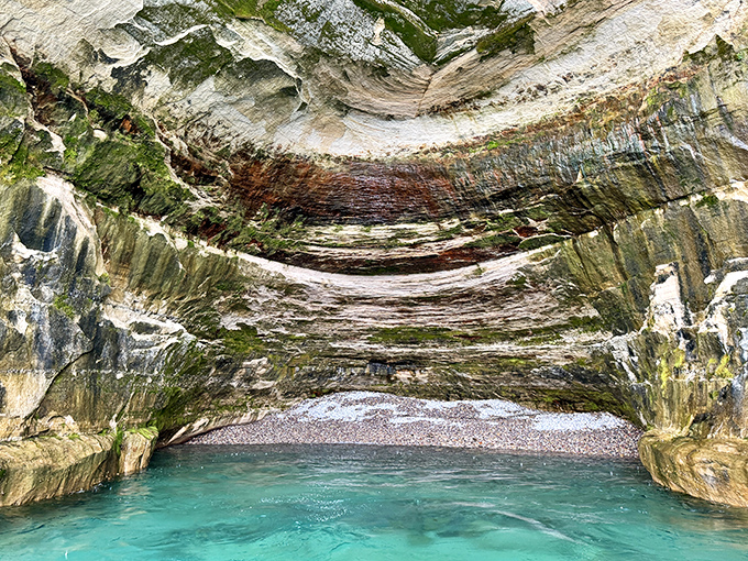 Inside nature's secret chamber, where water and time have carved a masterpiece that makes fancy hotels look unimaginative.