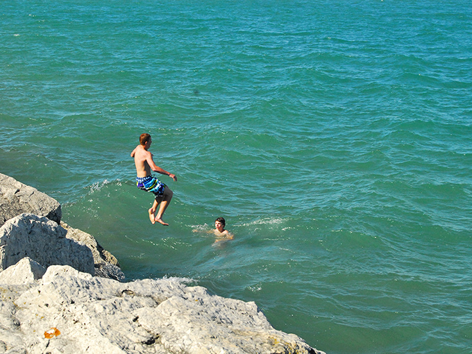 Swimming: Brave souls take the plunge from Lexington's rocky outcroppings &ndash; a summer tradition that's equal parts refreshing and exhilarating.