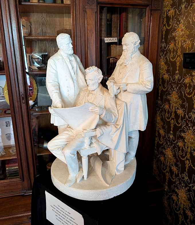 Lincoln and his generals plotting victory – history's heavyweights immortalized in pristine white marble.