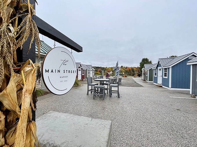 The Main Street Market sign welcomes visitors to explore local shops after meeting Hart's famous metallic resident.