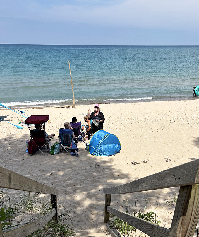 Families claim their spots on the sand like they've discovered their own private island, which isn't far from the truth on quieter days.