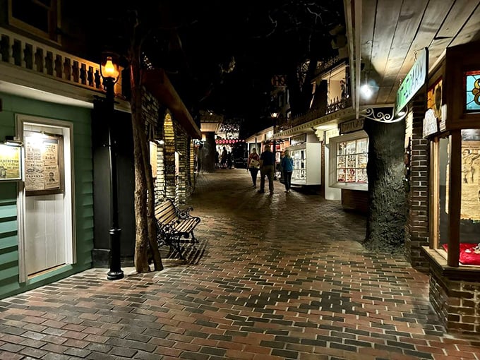 Nighttime never ends in this indoor village street, where vintage shops and mysterious doorways beckon curious explorers.