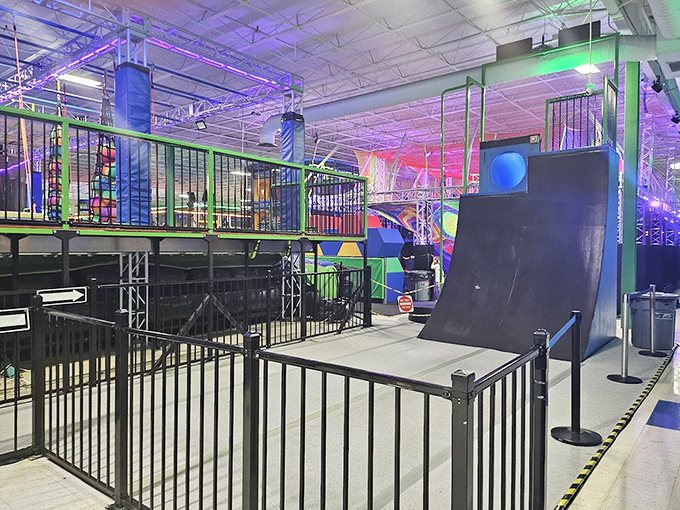 The Warped Wall challenges visitors to defy physics and common sense, creating that perfect moment between "I can do this" and "Why did I try this?"
