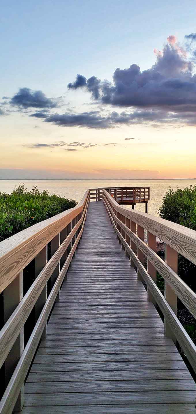 This wooden pier stretches toward the horizon like an invitation, offering front-row seats to Florida's most spectacular sunset show.