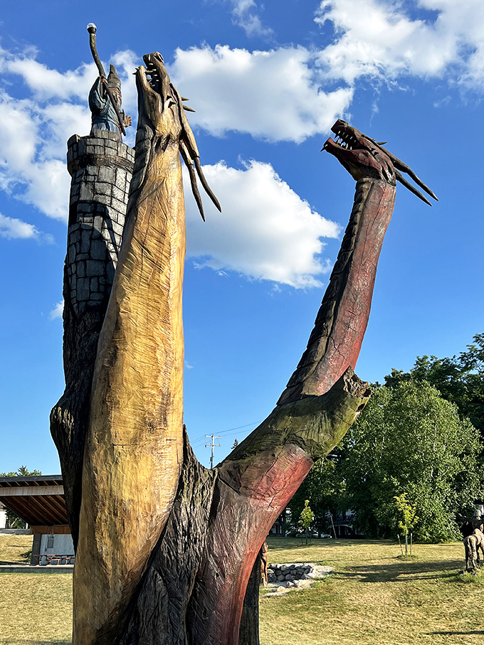 Reaching skyward with dramatic flair, these sculptures transform what could have been forest tragedy into artistic triumph.