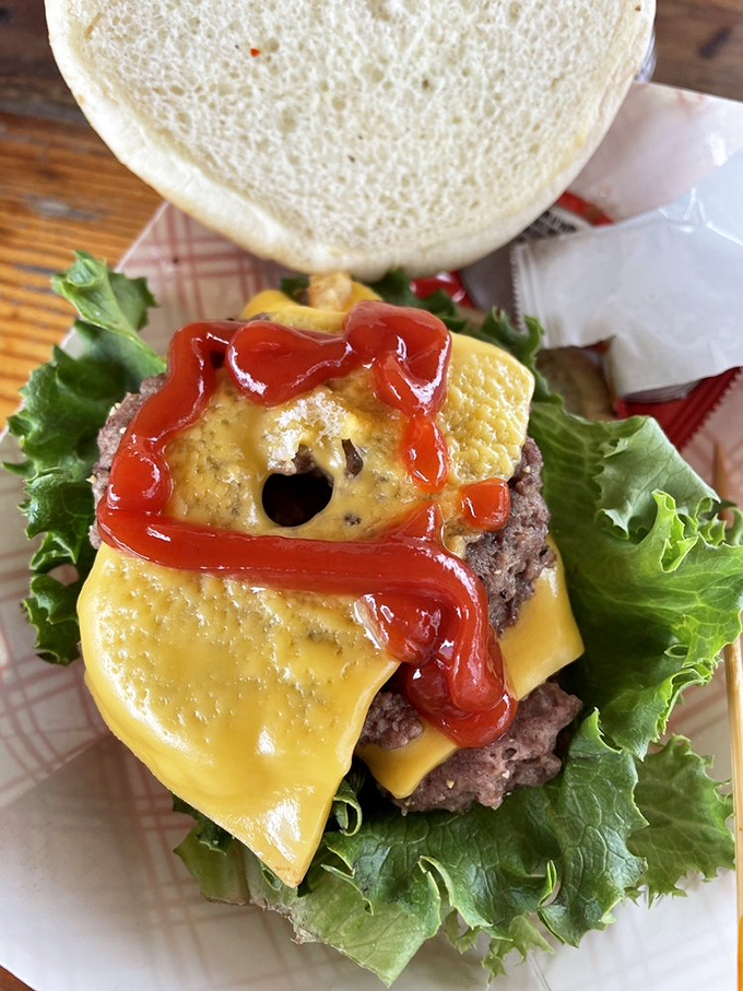 This isn't just any cheeseburger &ndash; it's a $3 miracle of juicy beef, melted cheese, and fresh toppings that defies economic logic.