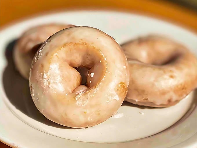 These aren't just glazed donuts – they're edible halos with that perfect crackling sugar shell that shatters just right with every heavenly bite.