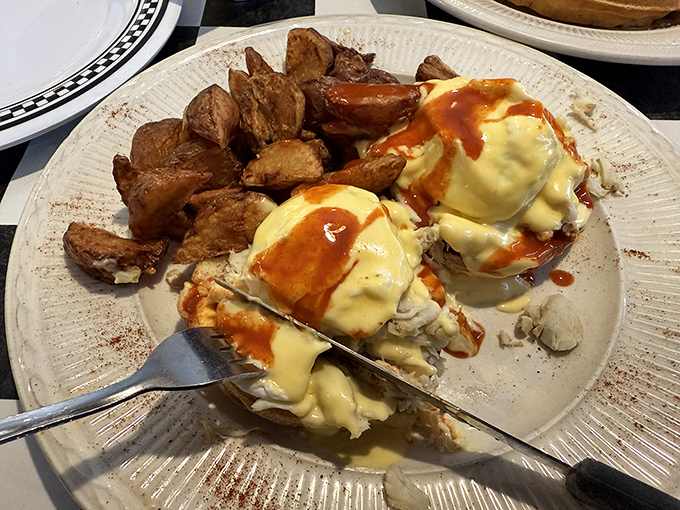Crab Benedict that would make Neptune jealous &ndash; real crab meat, perfectly poached eggs, and hollandaise sauce that's practically liquid gold.